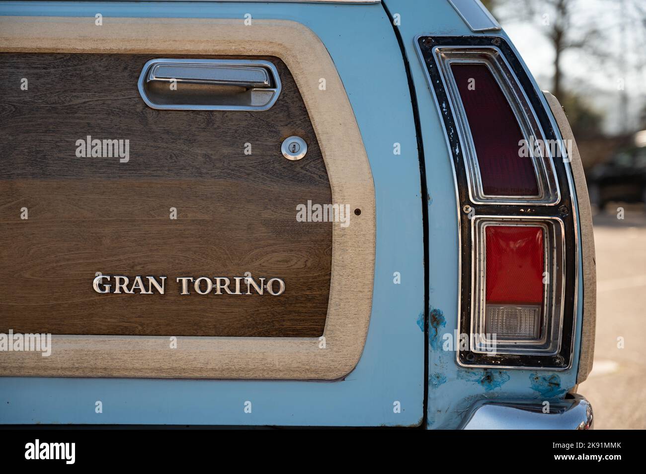 Closeup rear view of classic long station wagon with wood-veneered ...