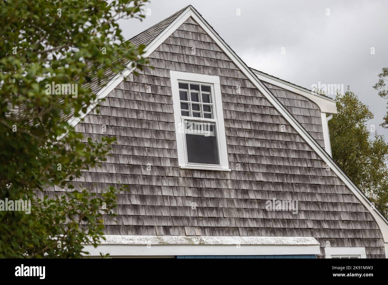 The windows and shingles on an old New England home on Martha's ...