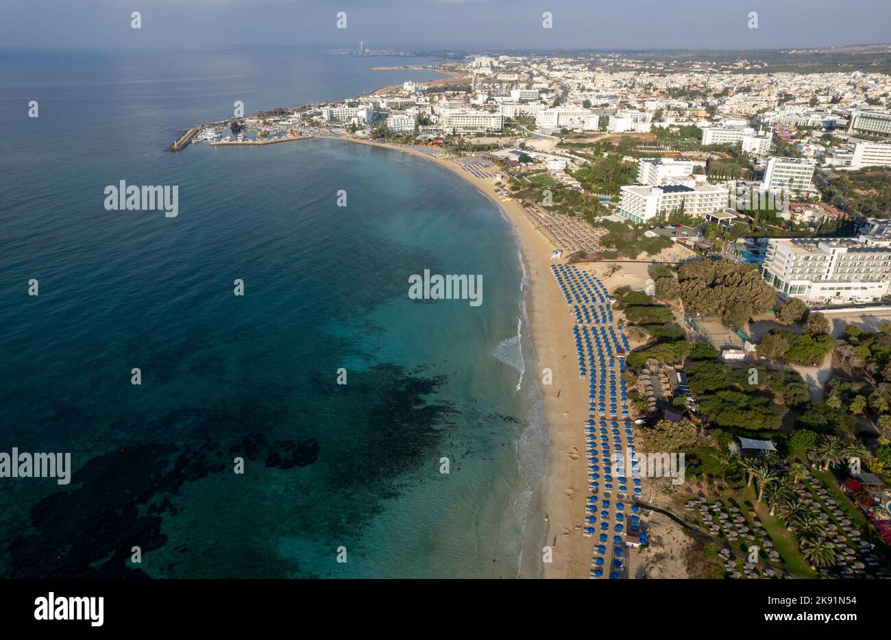 Aerial view of coastline with organised beach, Ayia Napa, Cyprus. Drone ...