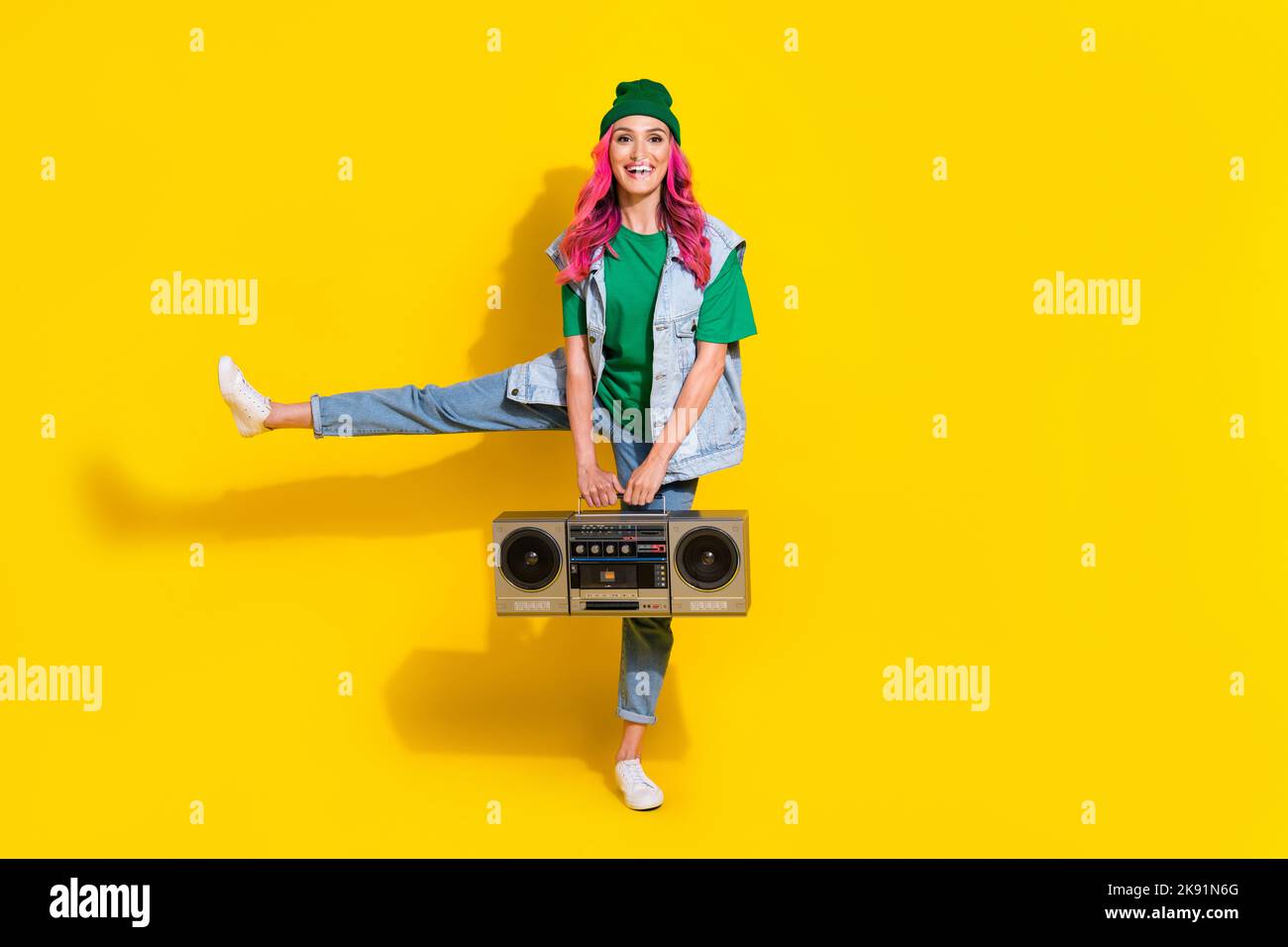 Full length photo of excited pretty girl dressed denim vest dancing ...