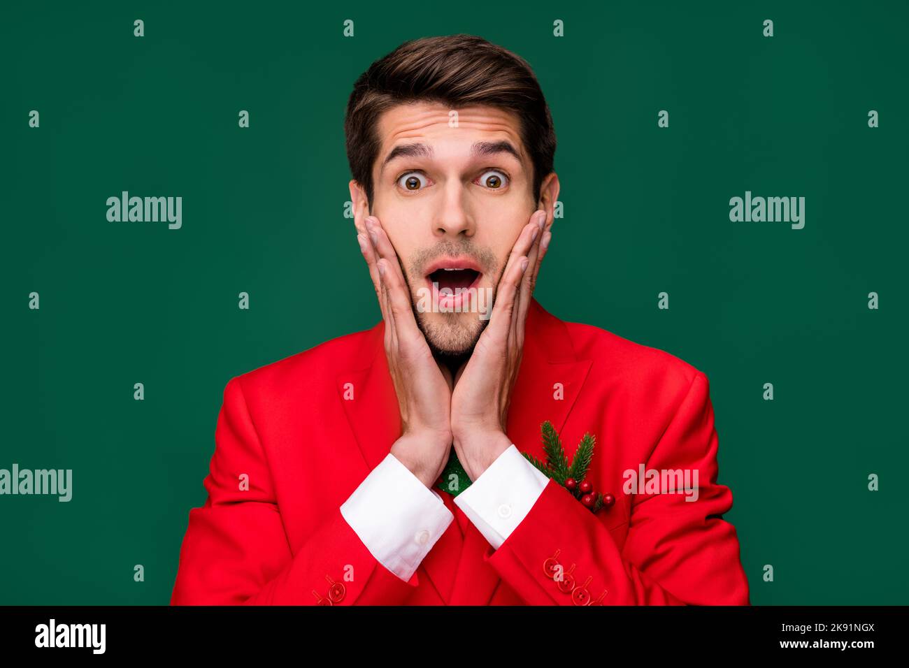 Photo of excited shocked santa claus guy wear red suit arms cheeks open ...