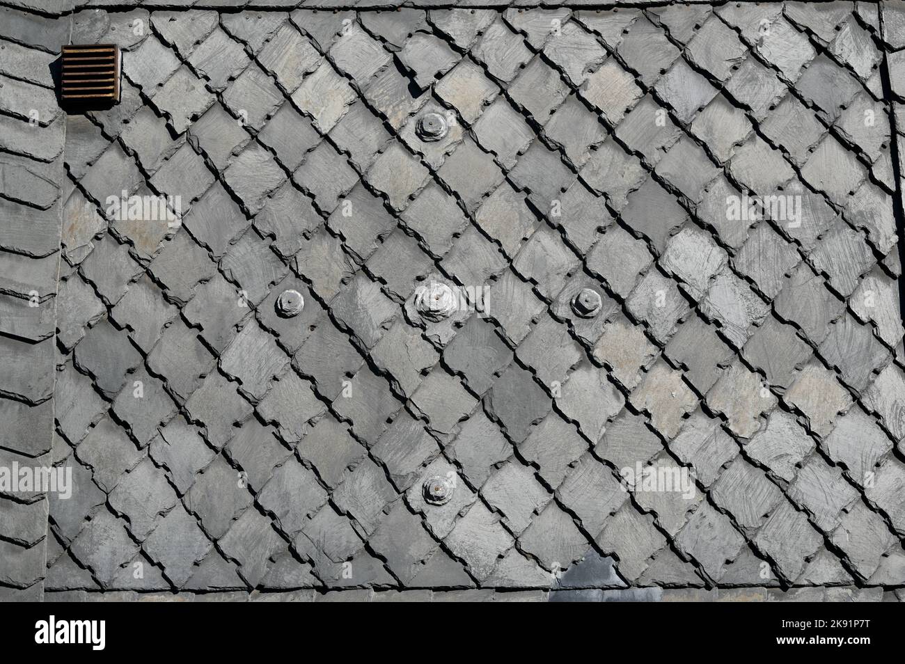 Gray slates as wall cladding on a house in detail Stock Photo - Alamy