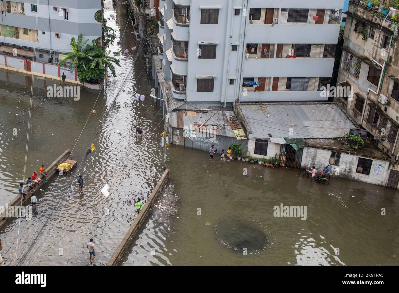 General view of a waterlogged Dhaka street following heavy rains ...