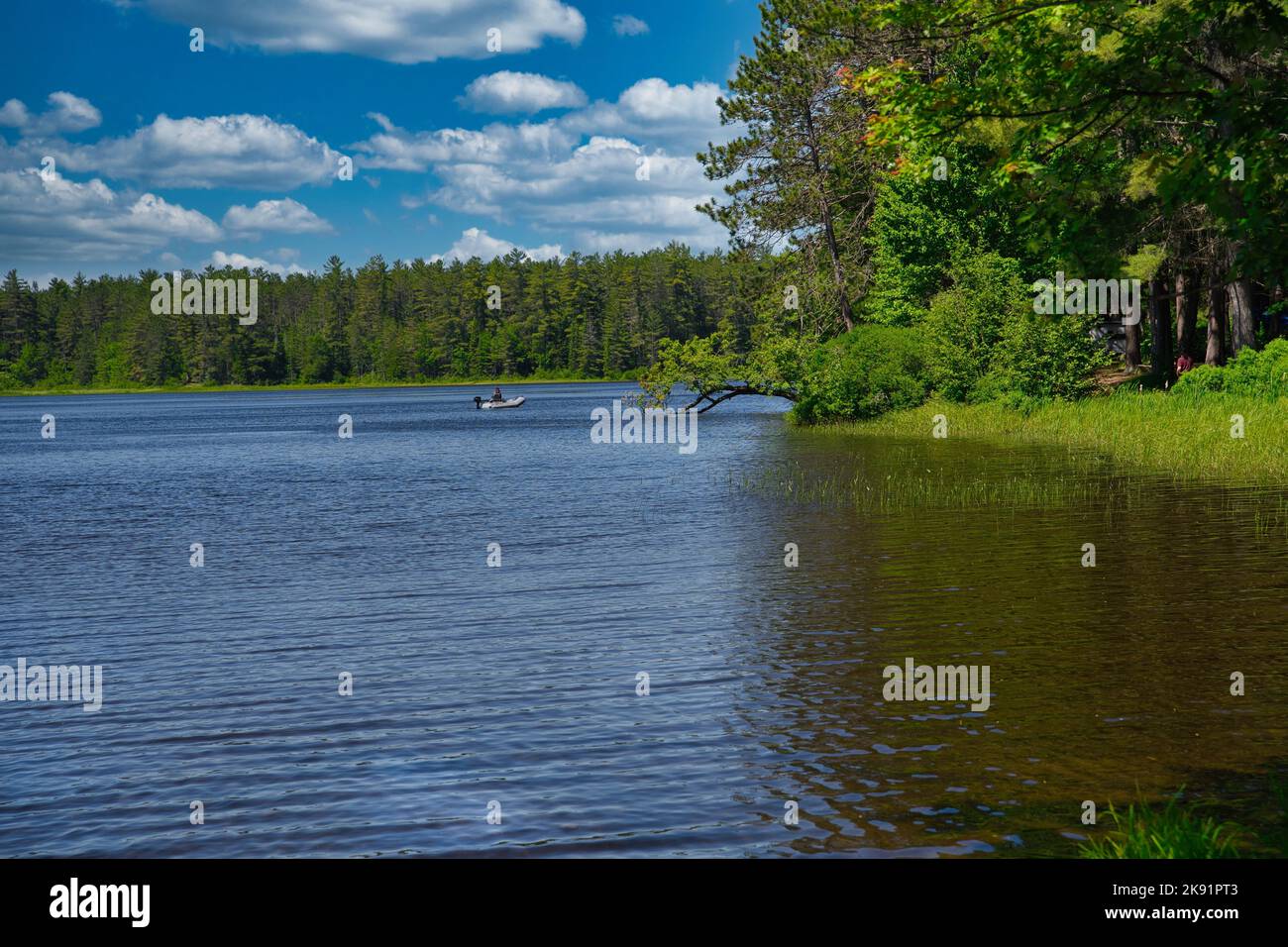 A beautiful landscape of the Mattawa river and trees in the background ...