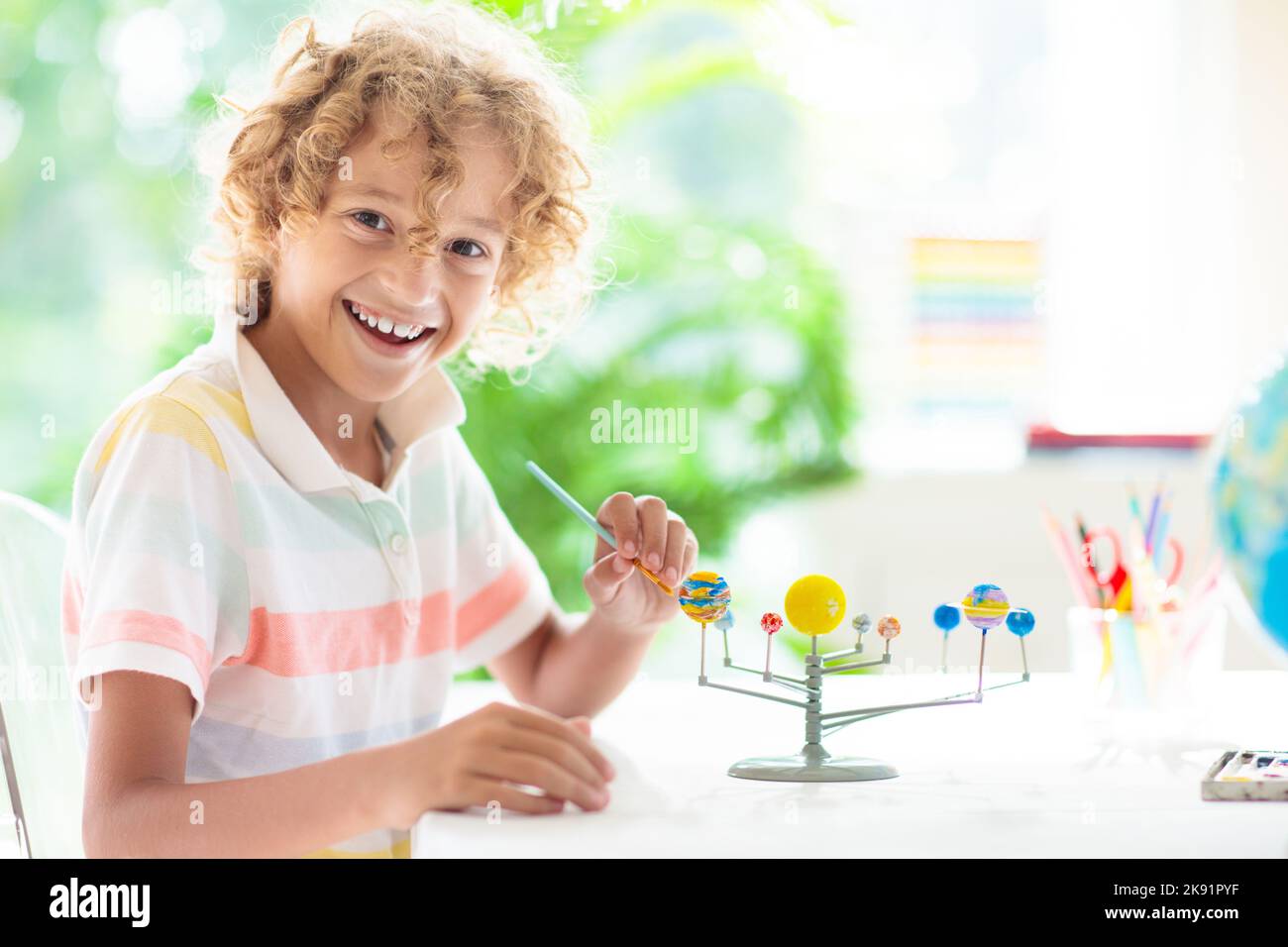Child with solar system model. Kids planetarium. Little boy coloring ...