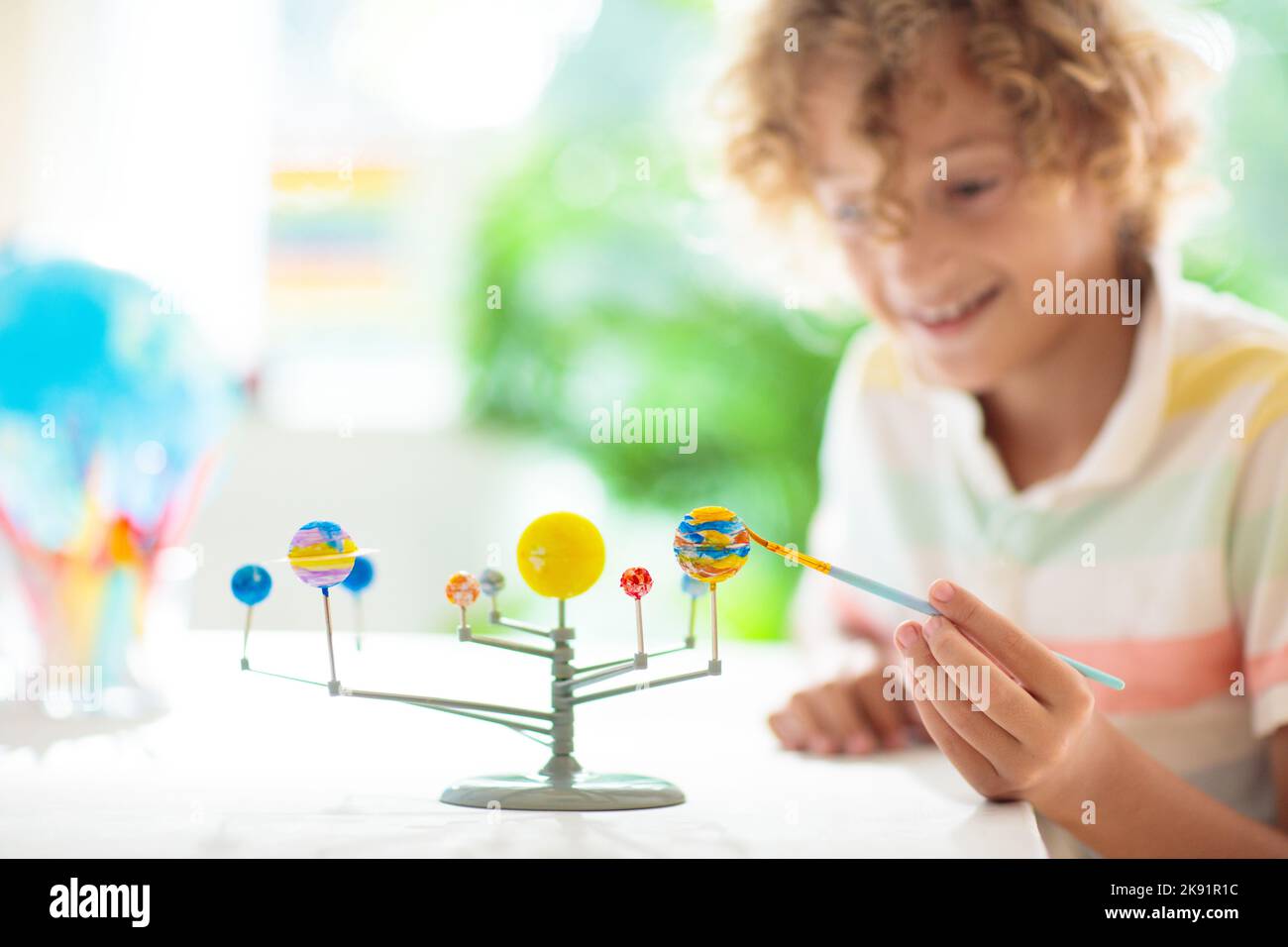 Child with solar system model. Kids planetarium. Little boy coloring ...