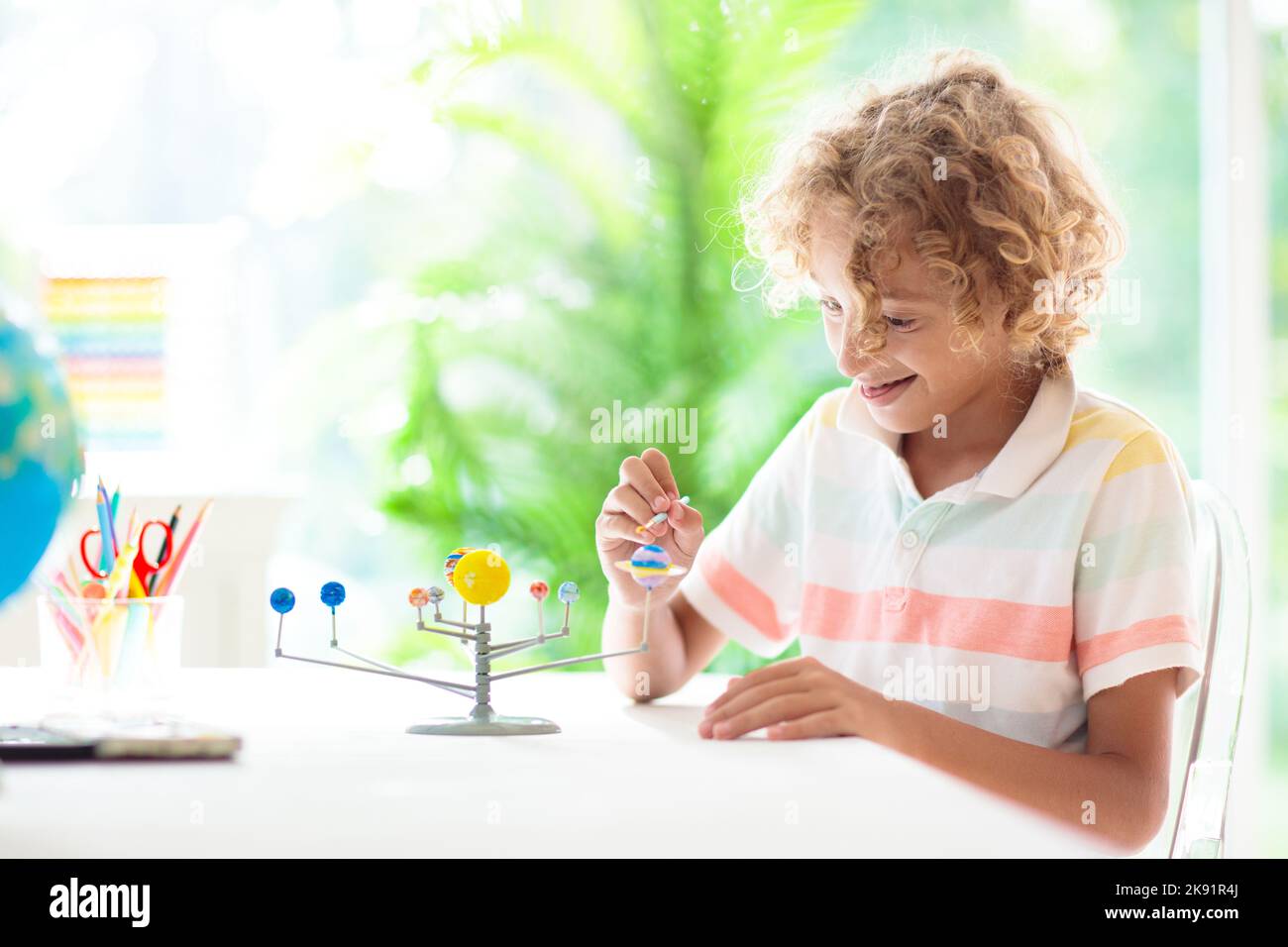 Child with solar system model. Kids planetarium. Little boy coloring ...