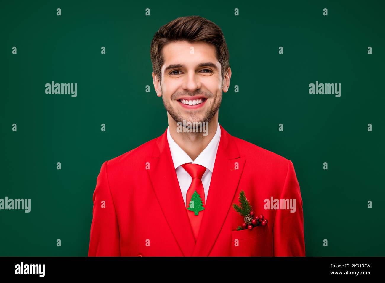 Photo of pretty cheerful santa claus guy dressed red jacket smiling ...