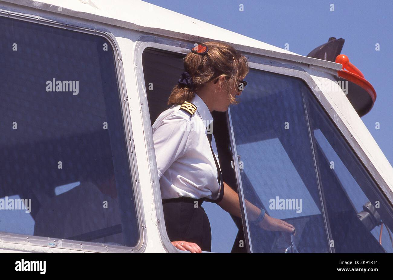 A ferryboast captain guides her boat into the harbour at Vancouver ...