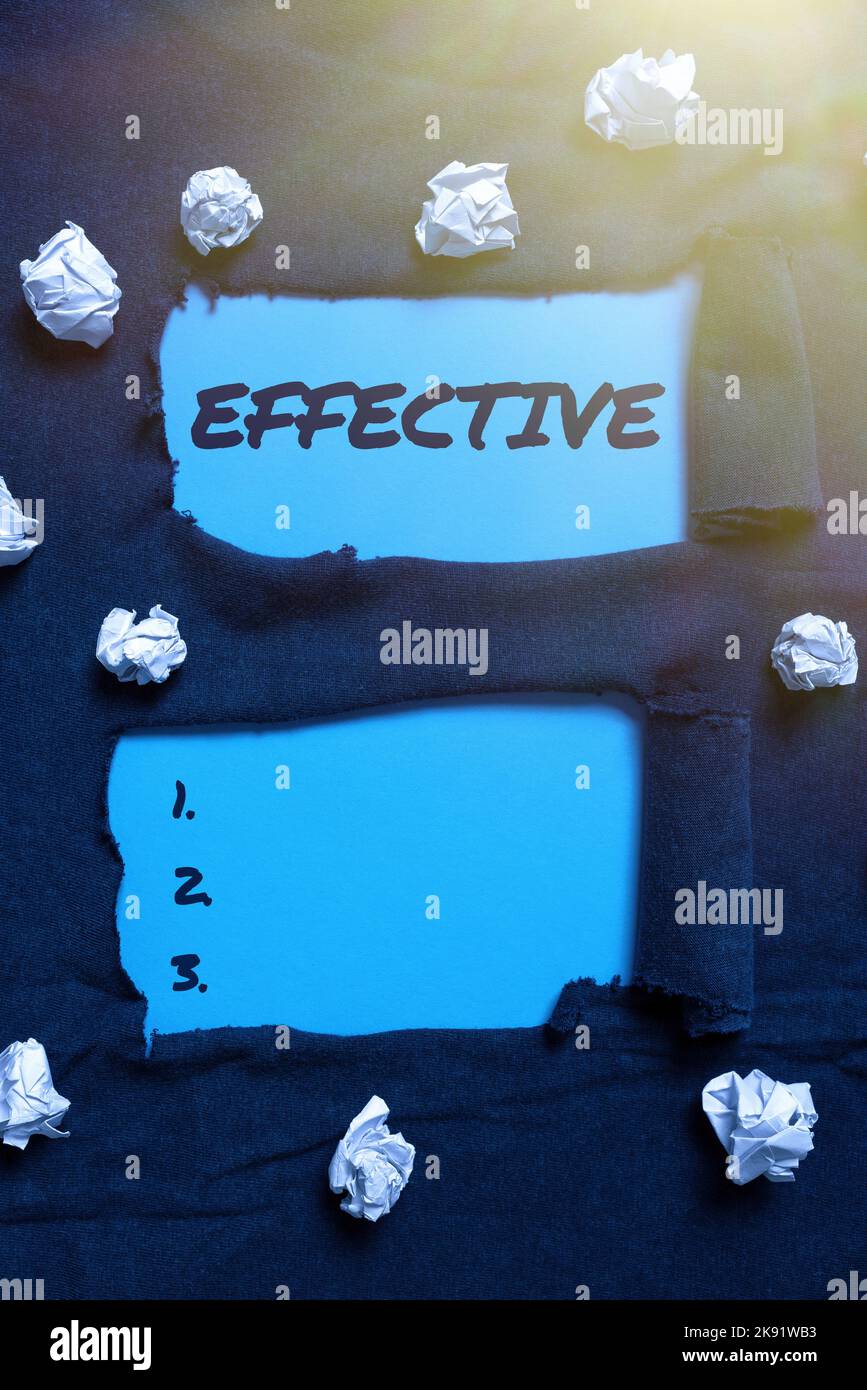 Hand writing sign Effective. Internet Concept equal to the rate of ...