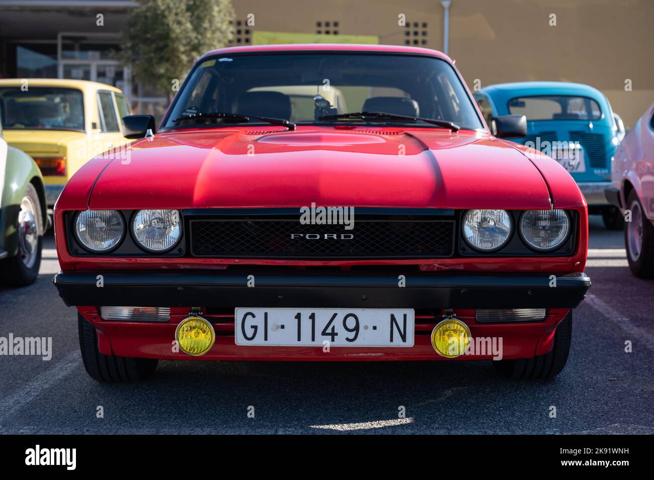 A close up shot of a shiny red Ford Capri car parked outside Stock ...