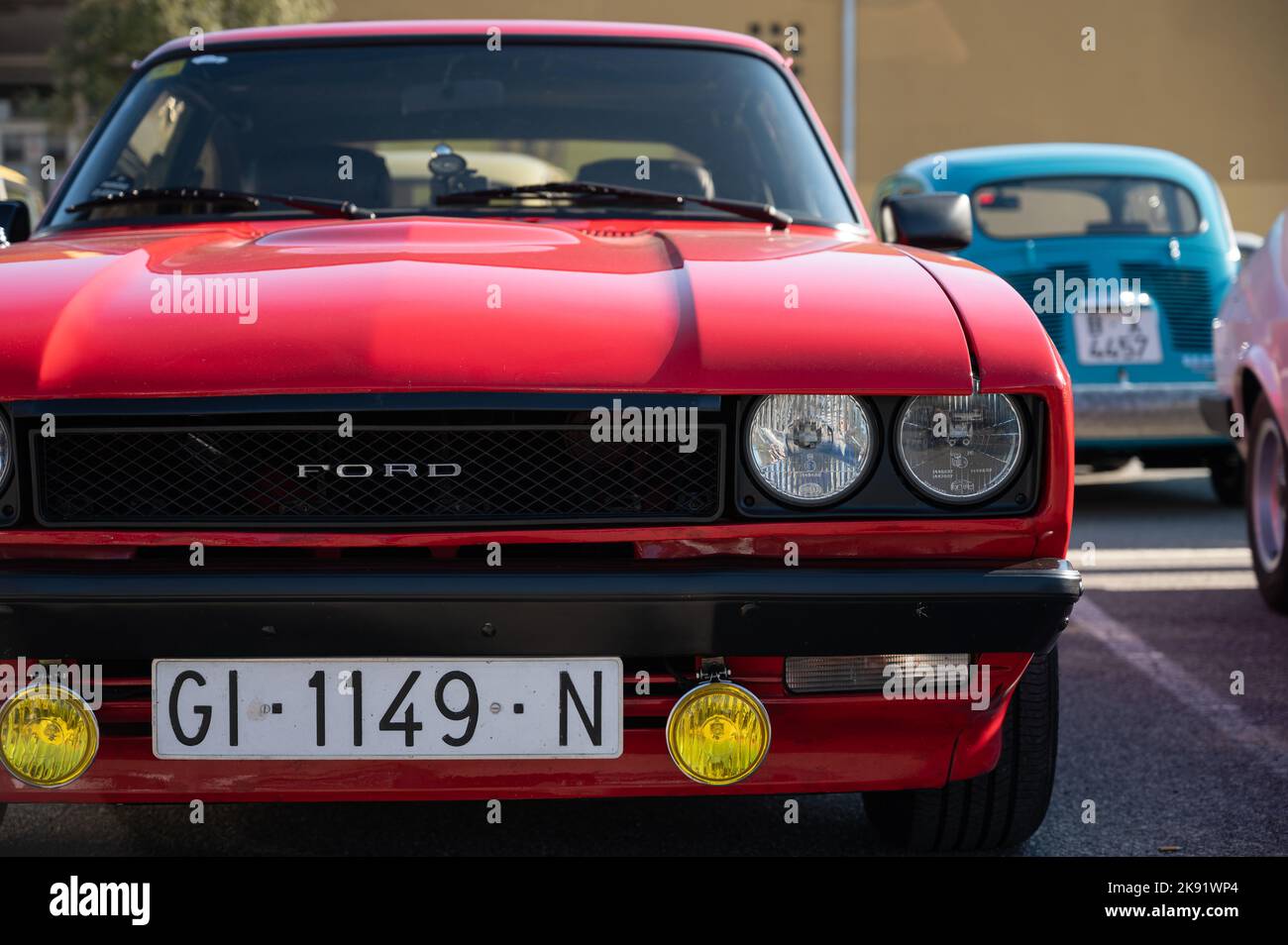 A close up shot of a shiny red Ford Capri car parked outside Stock ...