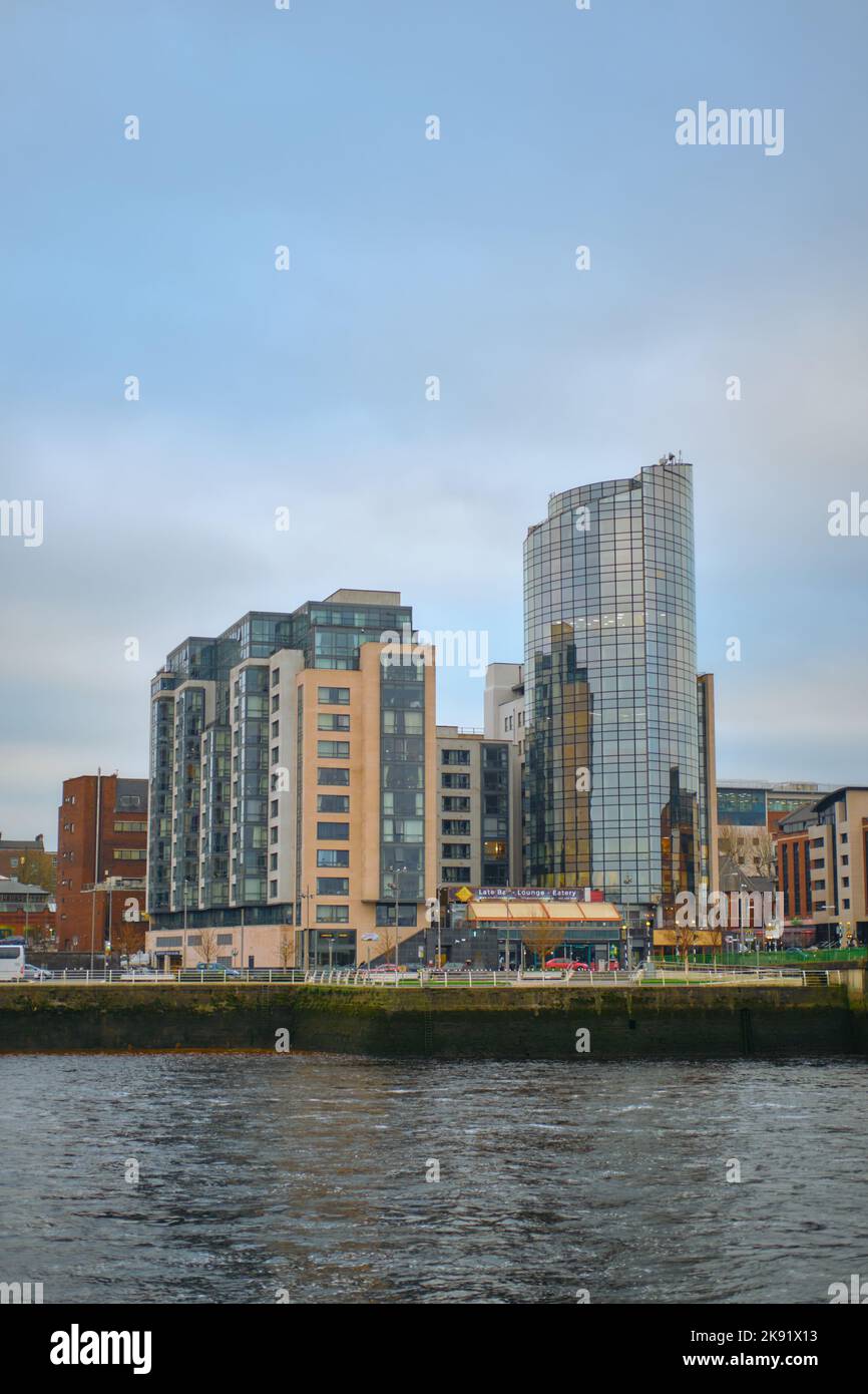 The exterior design of Limerick City buildings along the Shannon river ...