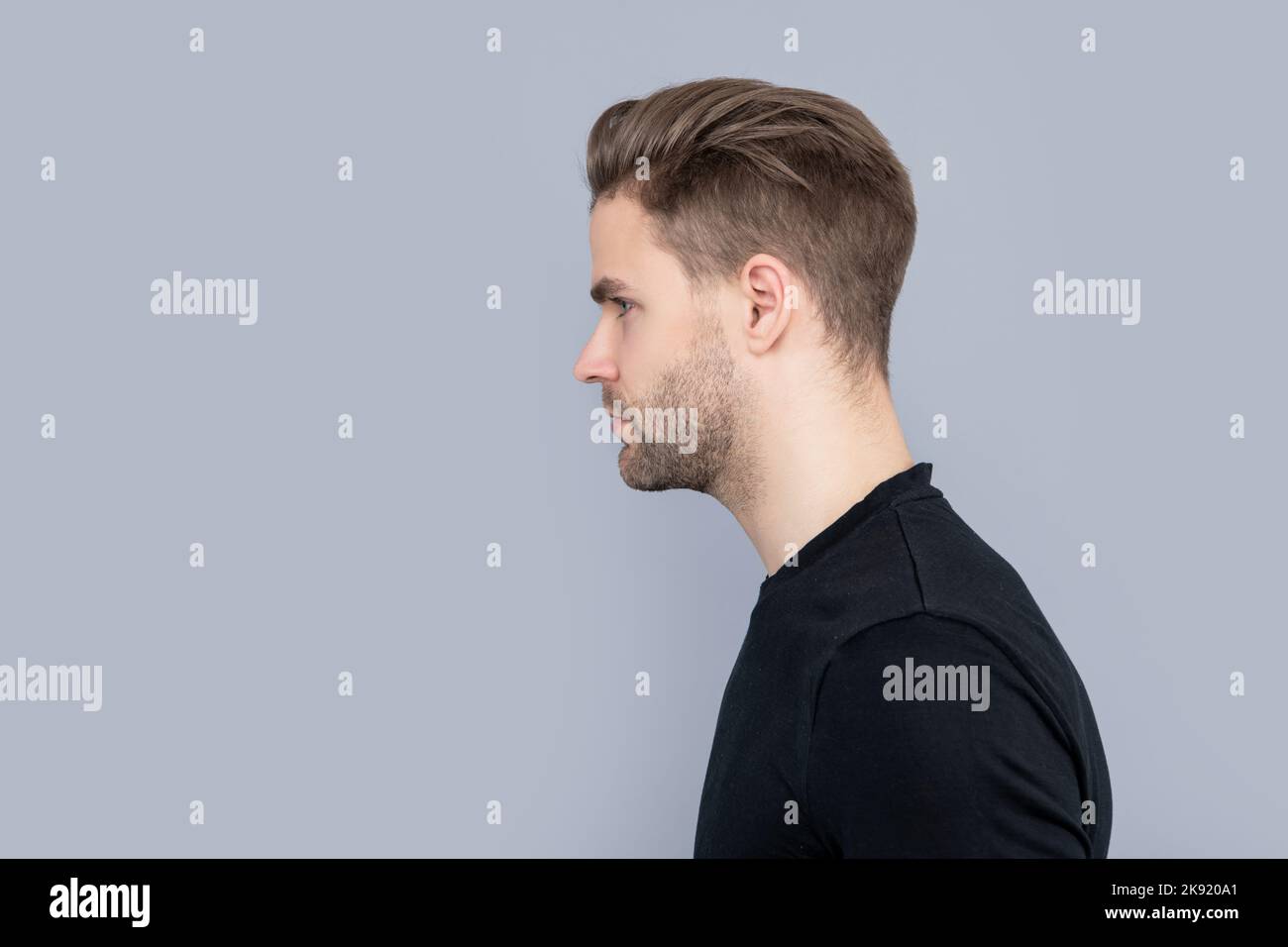 man with stubble isolated on grey background. face of caucasian man ...