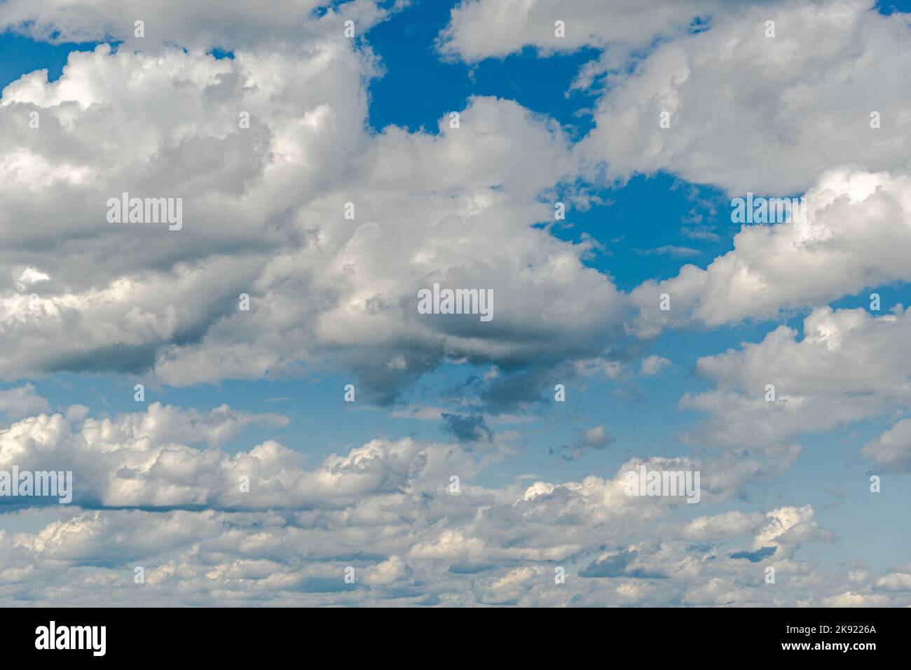 Different shapes of clouds in the sky Stock Photo - Alamy