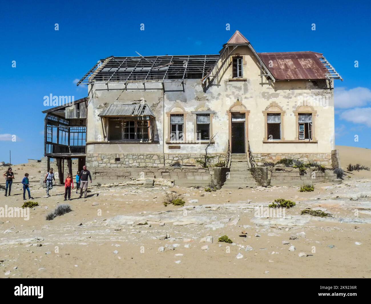 KOLMANSKOP, NAMIBIA - AUG 13, 2014: people visit Ghost town Kolmanskop ...