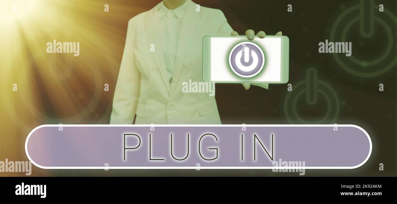 Hand writing sign Plug In. Internet Concept putting device into ...