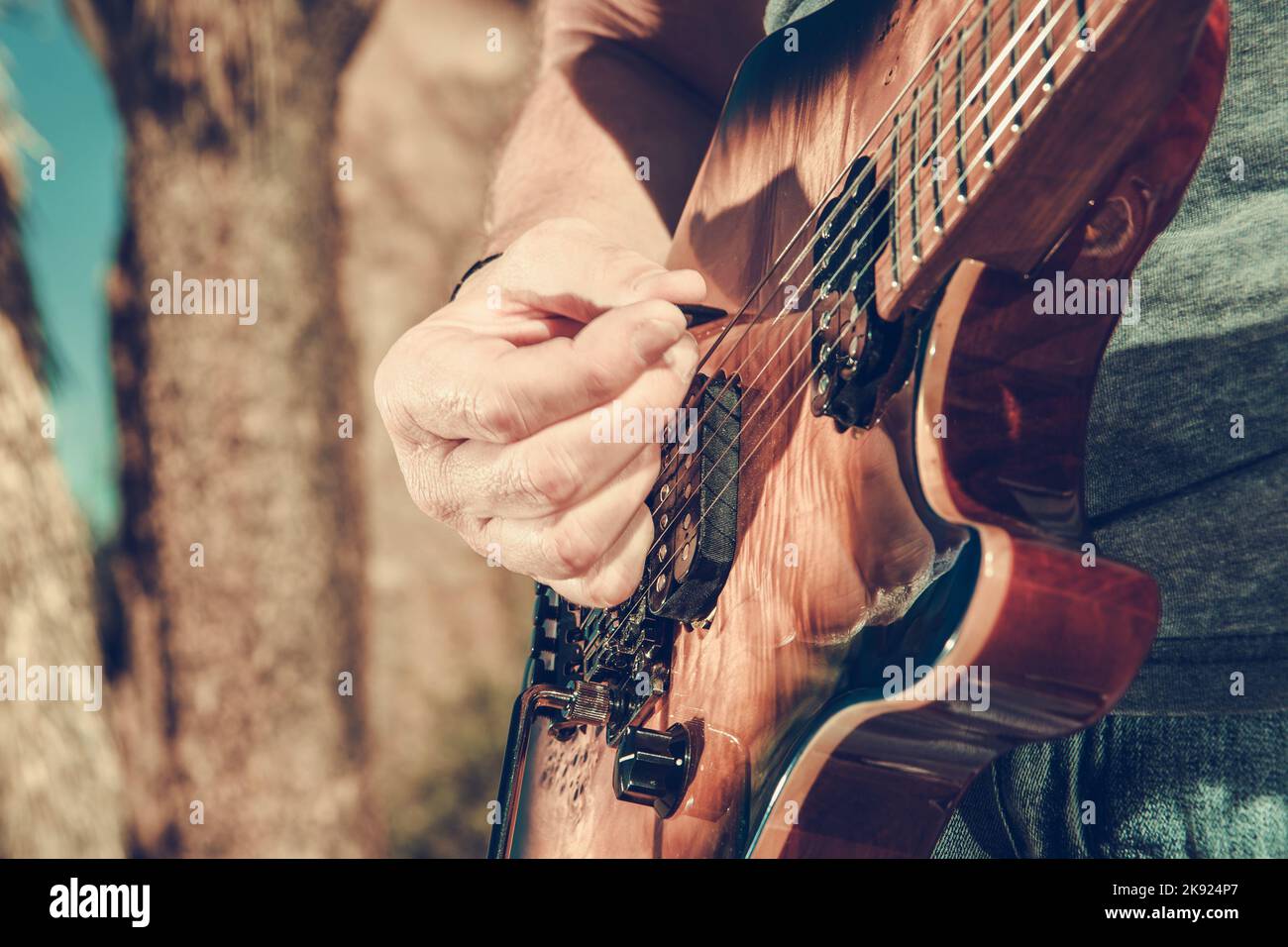 Guitarist playing on six string hi-res stock photography and images - Alamy