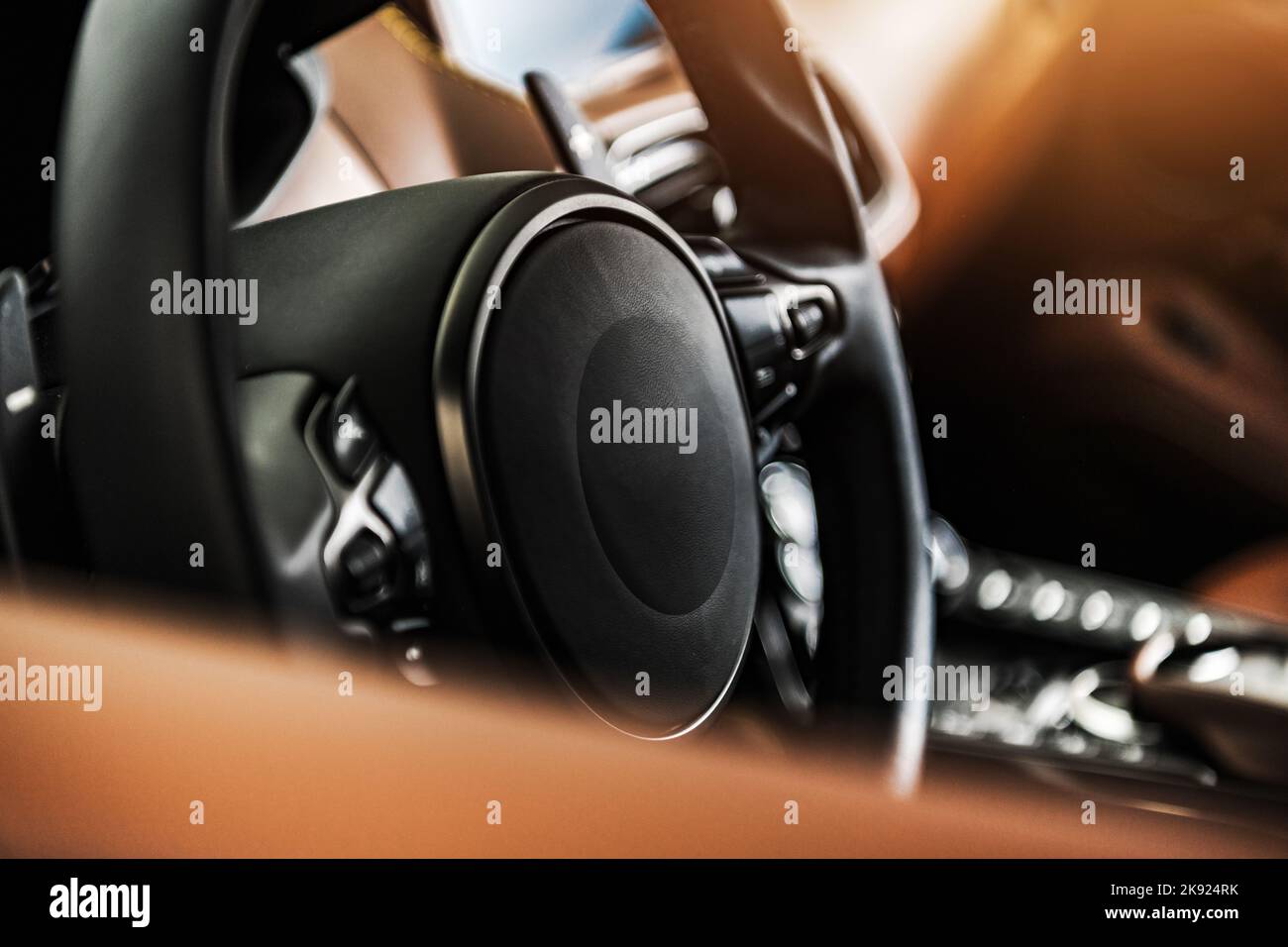Modern Car Leather Black Steering Wheel. Side view. Blurred Background ...