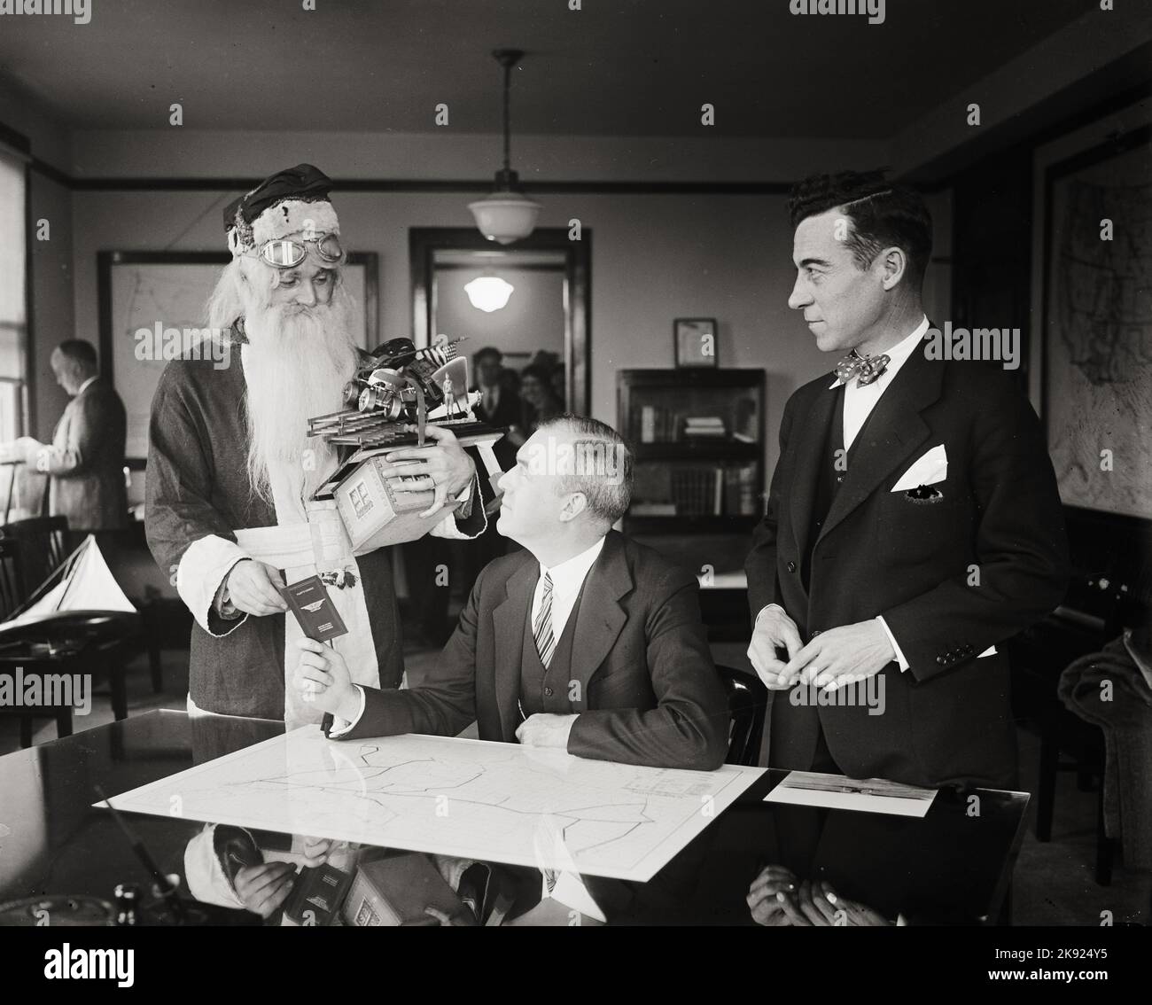 Santa Claus receives aeroplane pilot's license from Assistant Secretary ...