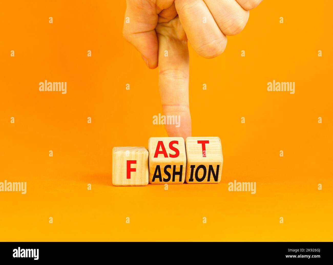 Fast fashion symbol. Concept words Fast fashion on wooden cubes ...