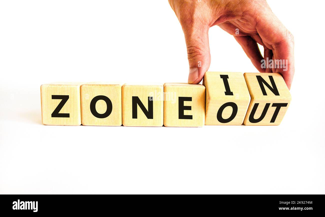 Zone in or out symbol. Concept words Zone in and Zone out on wooden ...