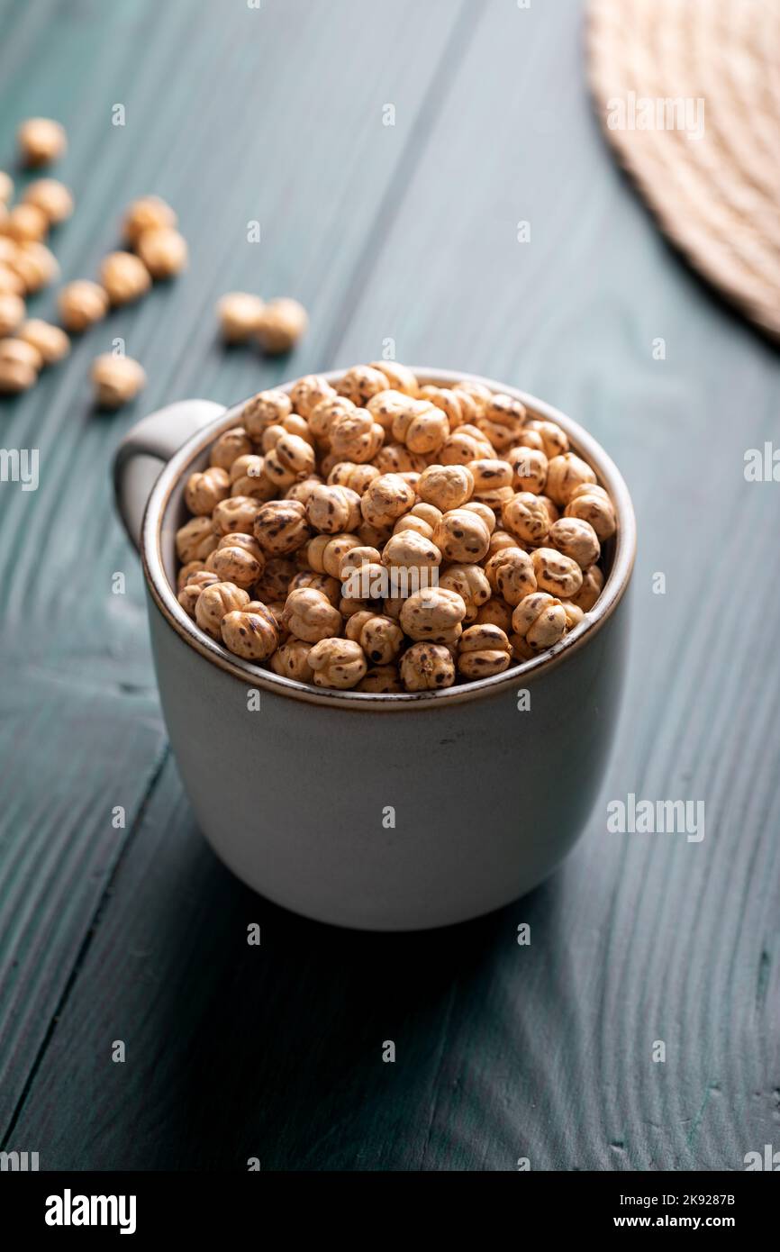 Roasted, yellow chickpeas in a cup Stock Photo - Alamy