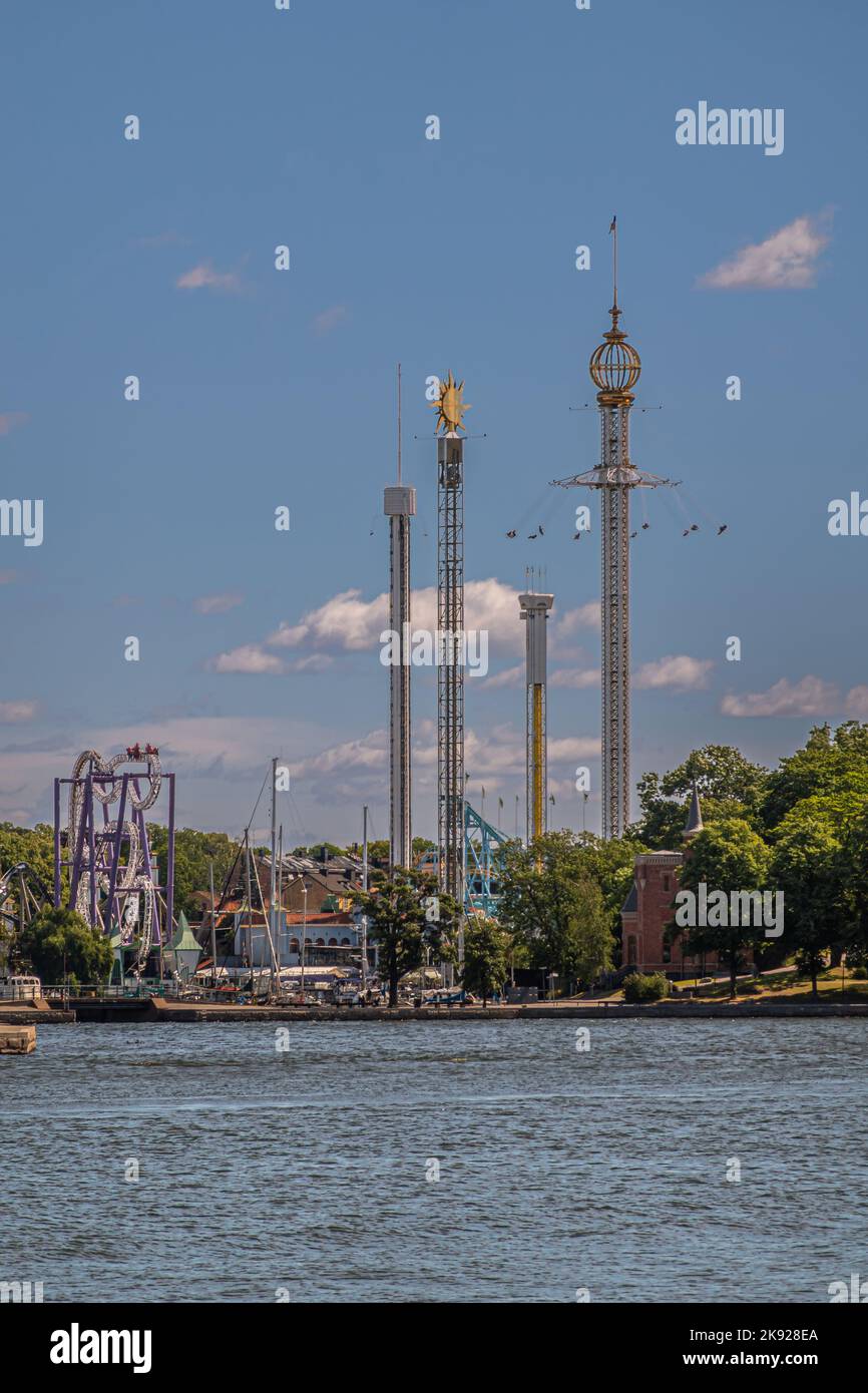 Sweden, Stockholm - July 17, 2022: Tivoli park seen from Skeppsbron ...