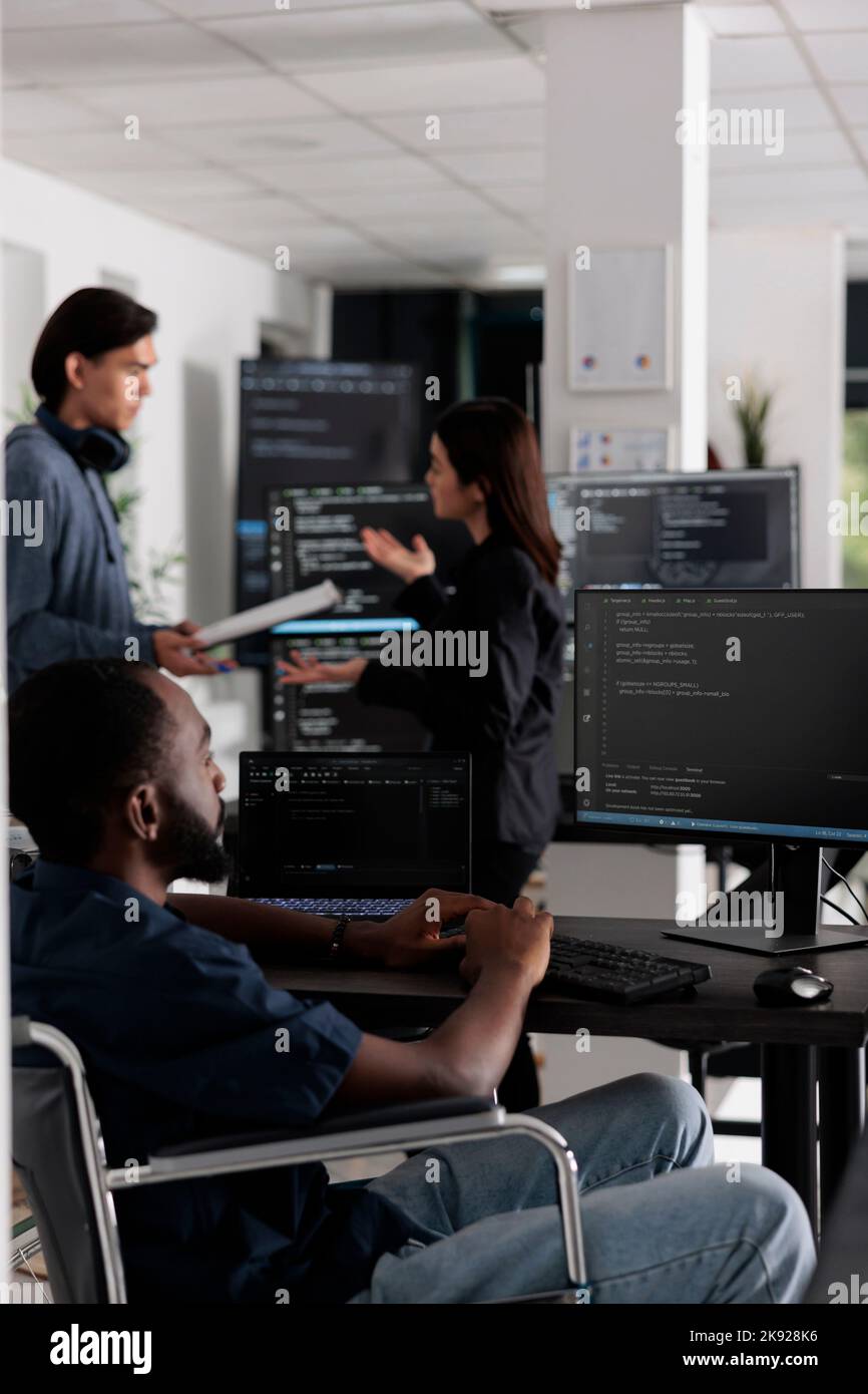 It Programmer In Wheelchair Typing Html Code In Coding Office Working On Server Program With