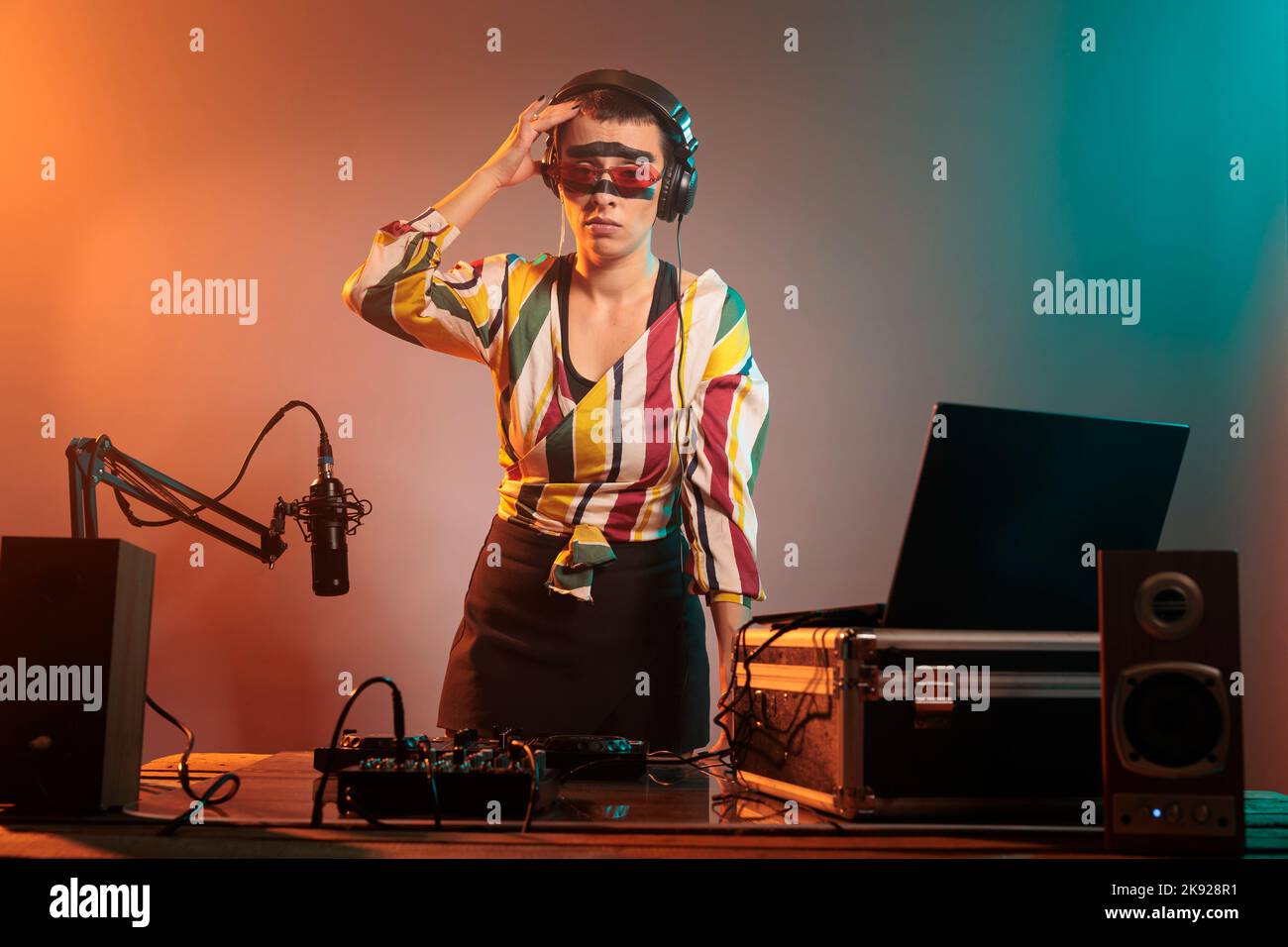 Female musician suffering from headache and pain, feeling stressed and ...