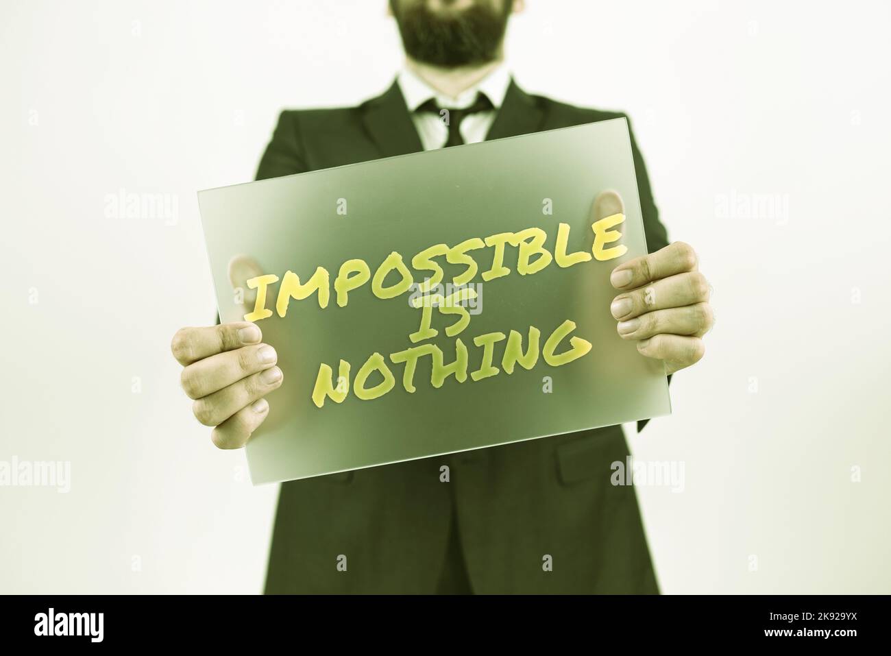 Conceptual caption Impossible Is Nothing. Business overview Motivated ...