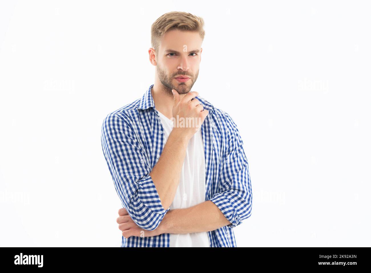 handsome studio shot of unshaven man. young unshaven man isolated on ...