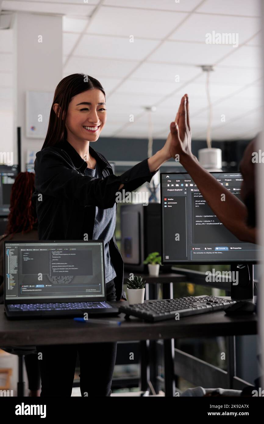 Diverse Successful Web Developers Celebrating Code Compiling Doing