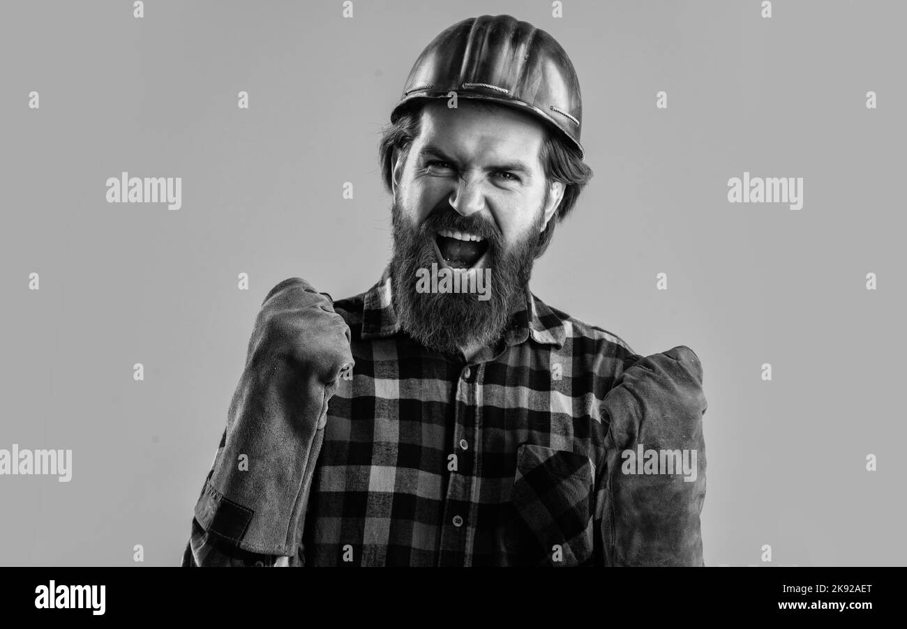 builder guy with working tool. brutal mature hipster wear checkered ...