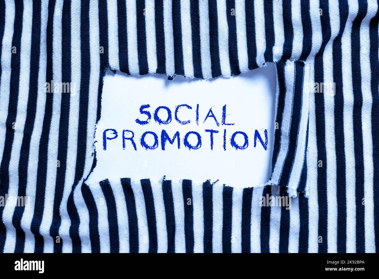 Hand writing sign Social Promotion. Internet Concept evaluate the ...