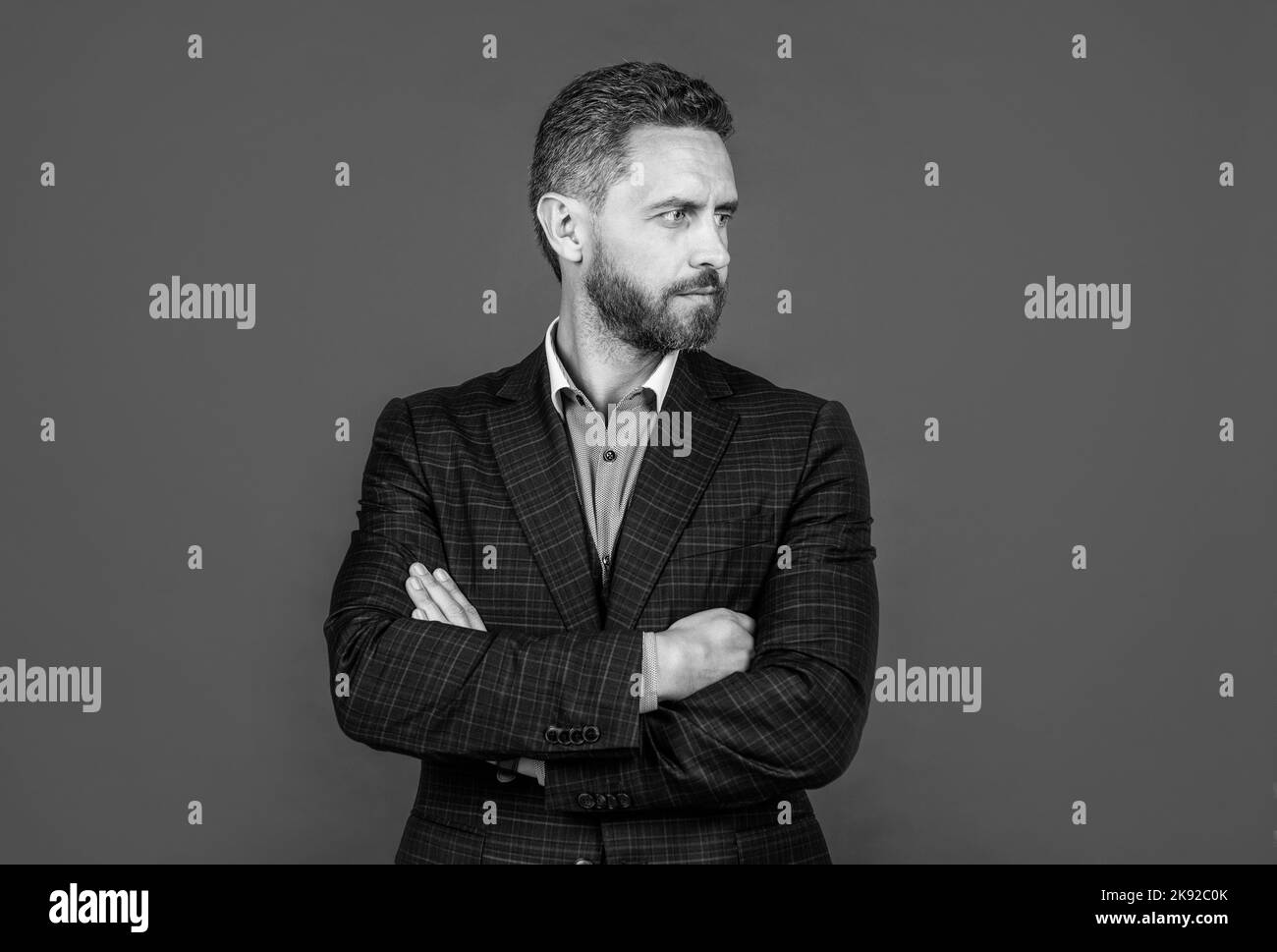 successful man in businesslike suit. serious entrepreneur or manager ...