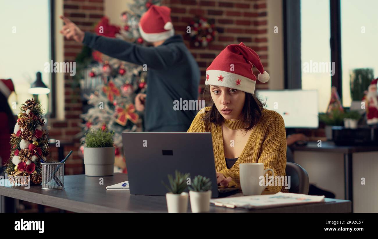 Portrait festive employee using laptop hi-res stock photography and ...