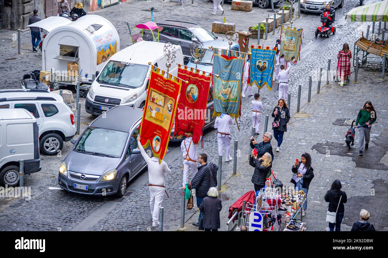 April 22 2022-procession with people dressed in white on the street in ...