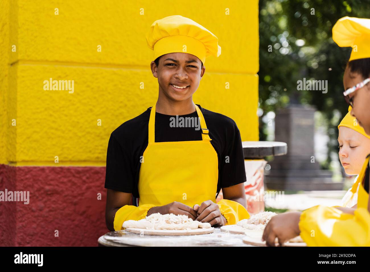 African teenager cooking hi-res stock photography and images - Alamy
