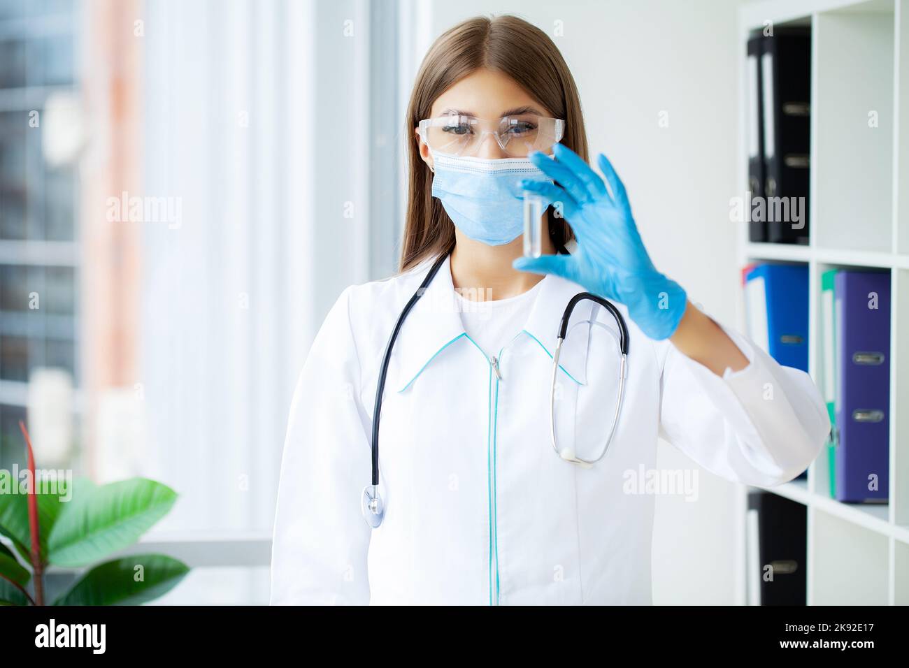 Doctor scientist in lab doing chemical test Stock Photo - Alamy
