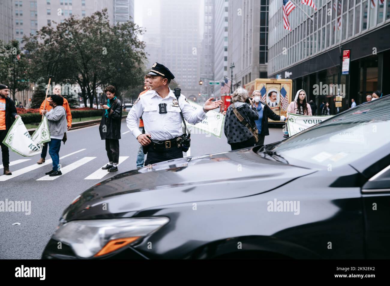 Police officers direct traffic as activists block Park Avenue during ...