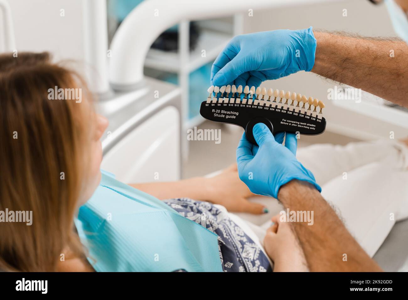 Teeth color shades guide close-up. Dentistry. Veneers or implants teeth ...