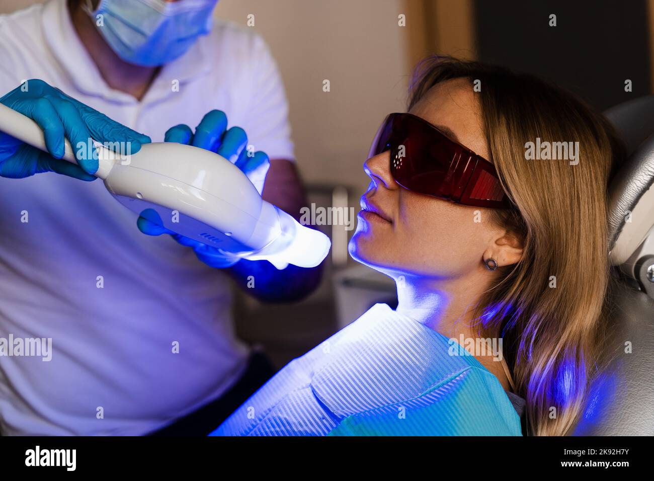 Artificial teeth whitening. Dental ultraviolet whitening treatment with ...