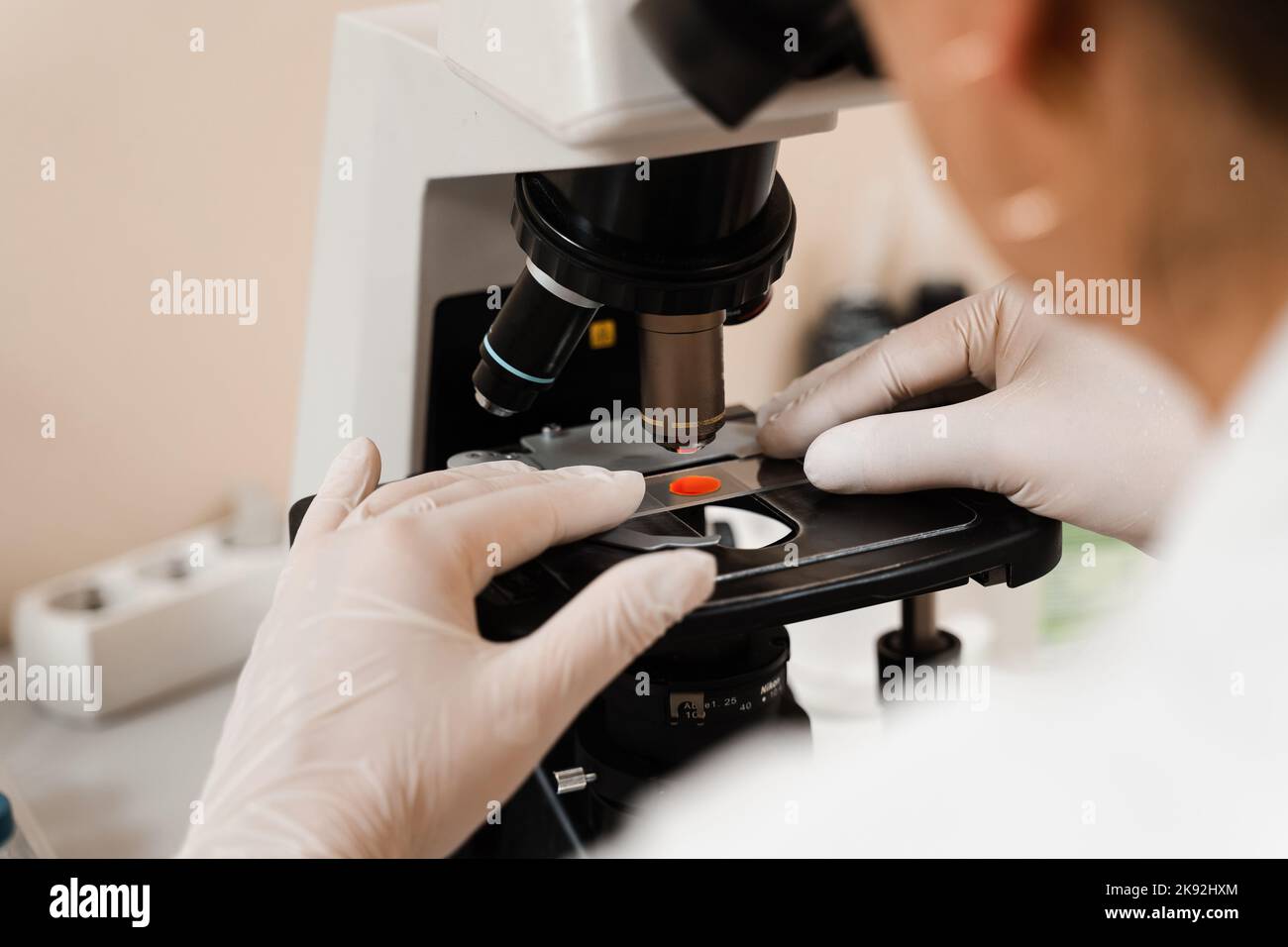 Blood analysis using microscope laboratory close-up. Medical equipment ...