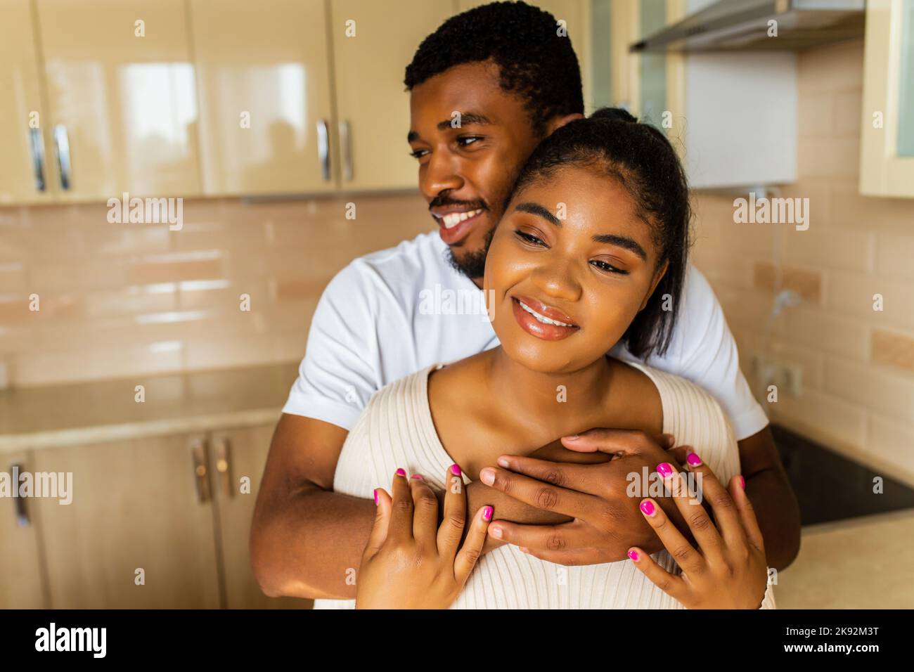 Young Happy Mixed Race Couple Spending Their Time At Home In The