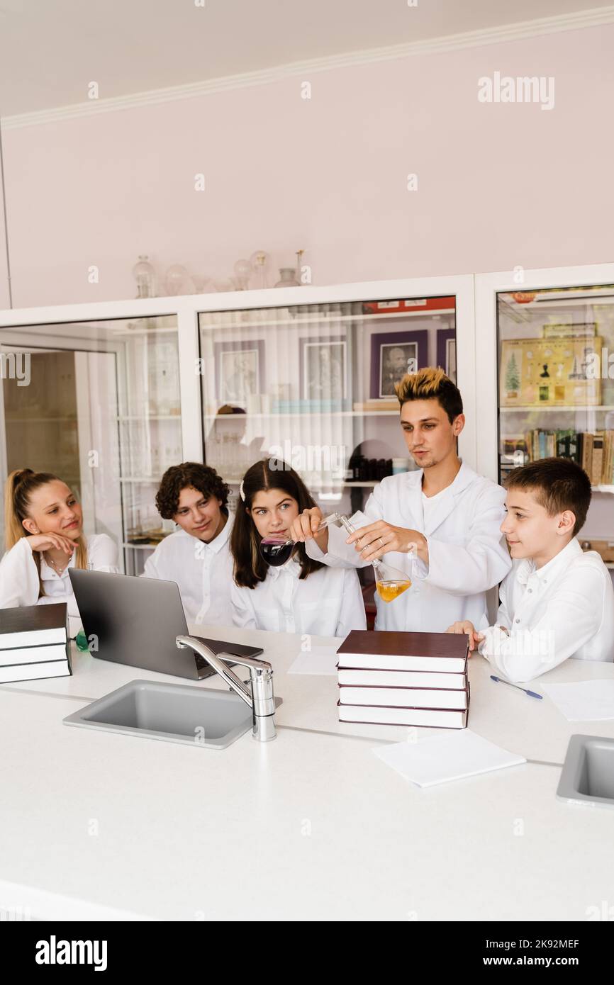 Education. Chemical experiments at a chemistry lesson at school ...