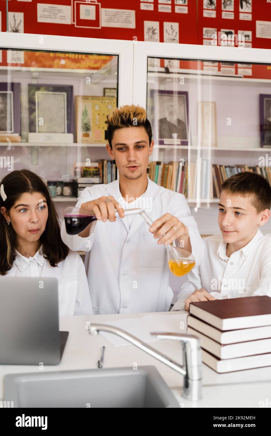 Education. Chemical experiments at a chemistry lesson at school ...