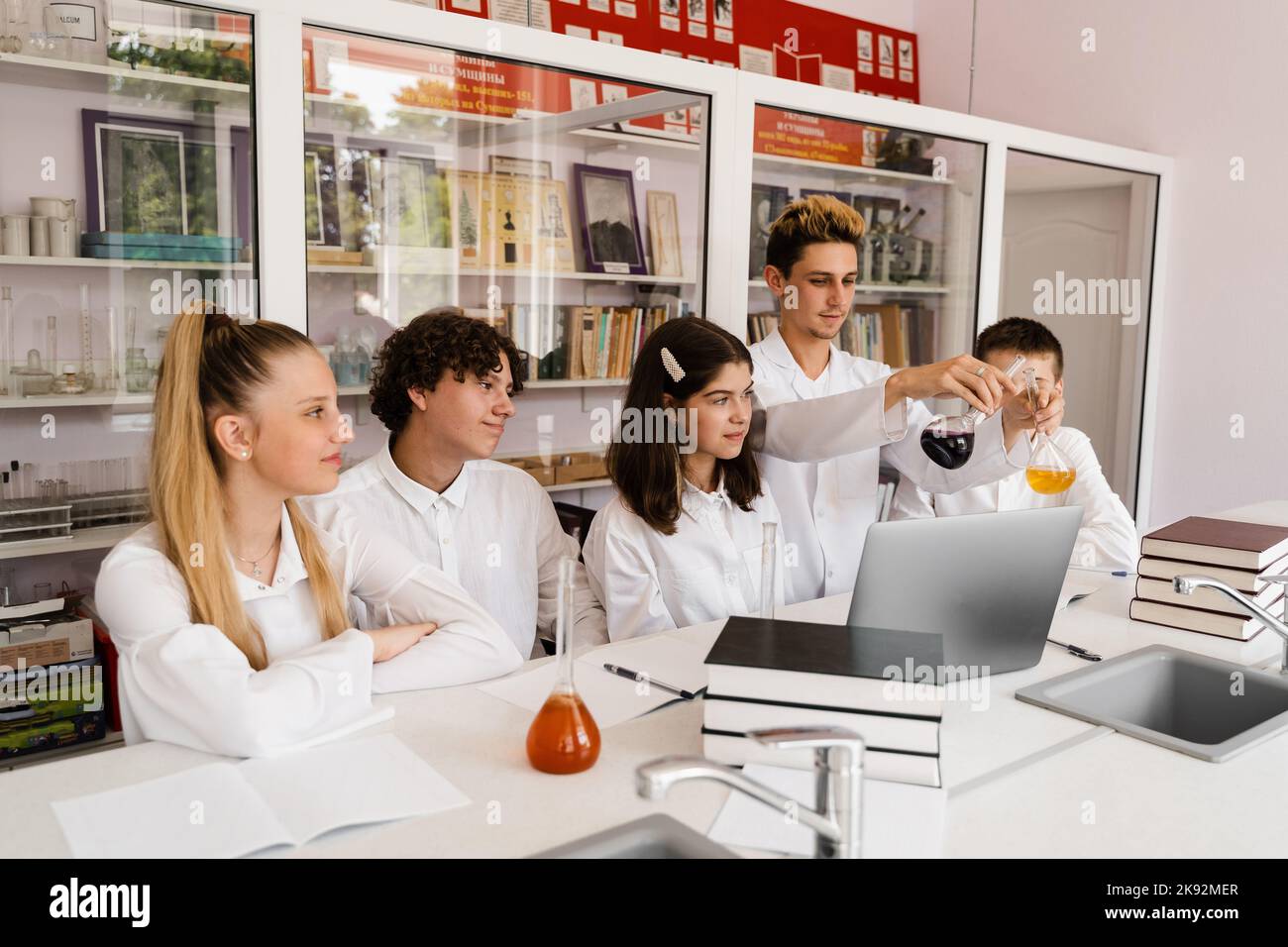 Education. Chemical experiments at a chemistry lesson at school ...