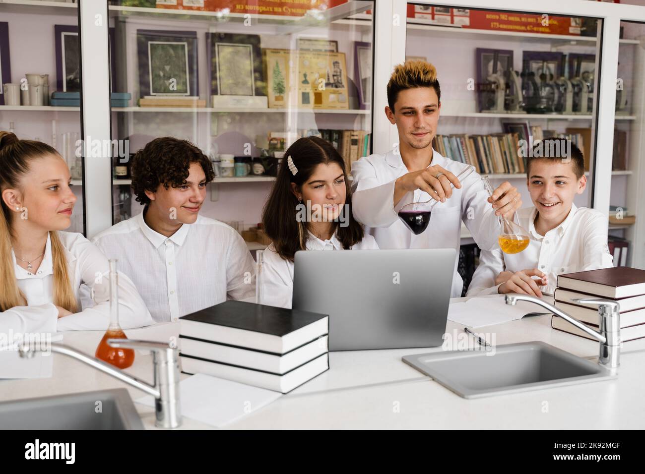 Education. Chemical experiments at a chemistry lesson at school ...