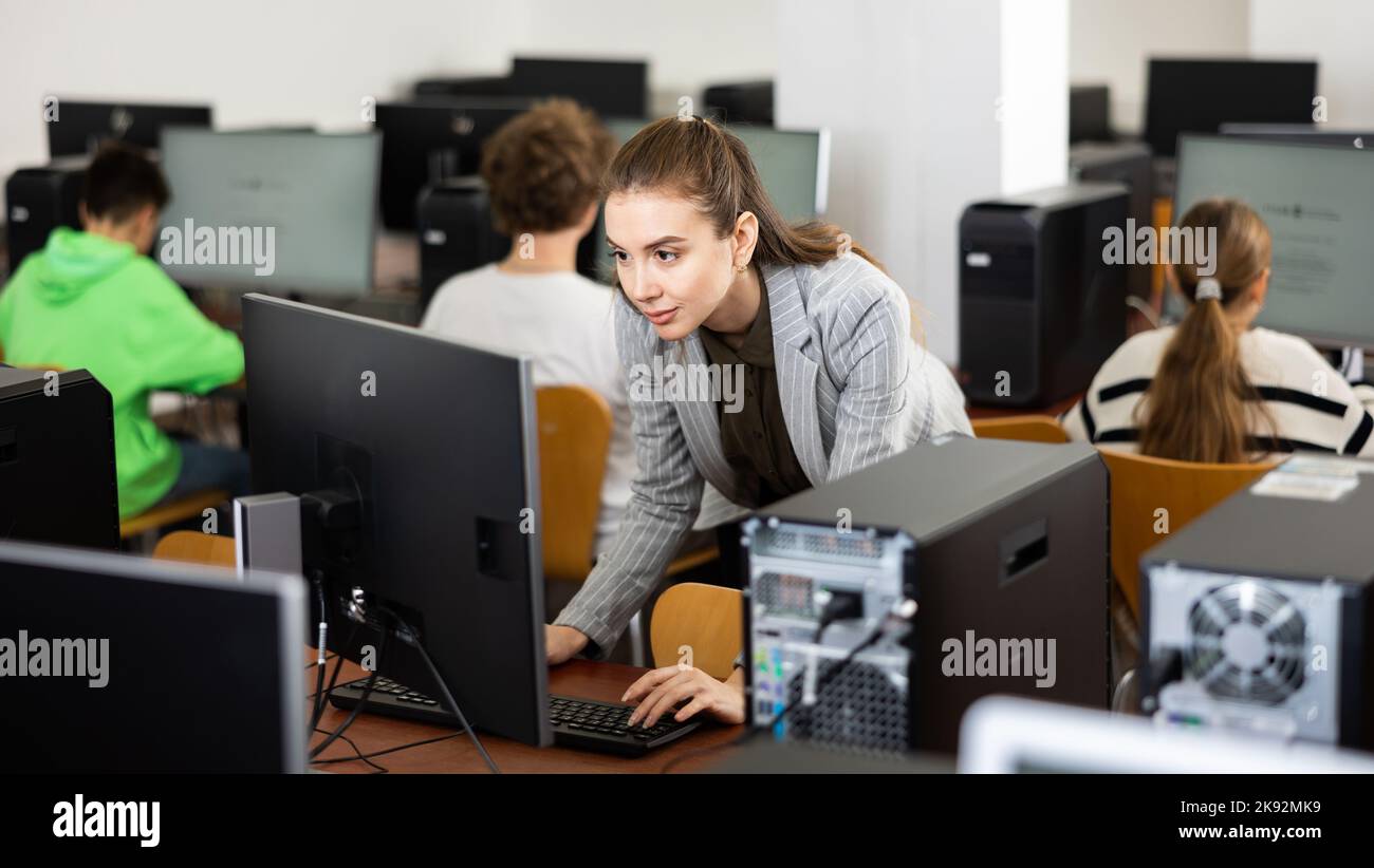 Reading computer interested hi-res stock photography and images - Alamy